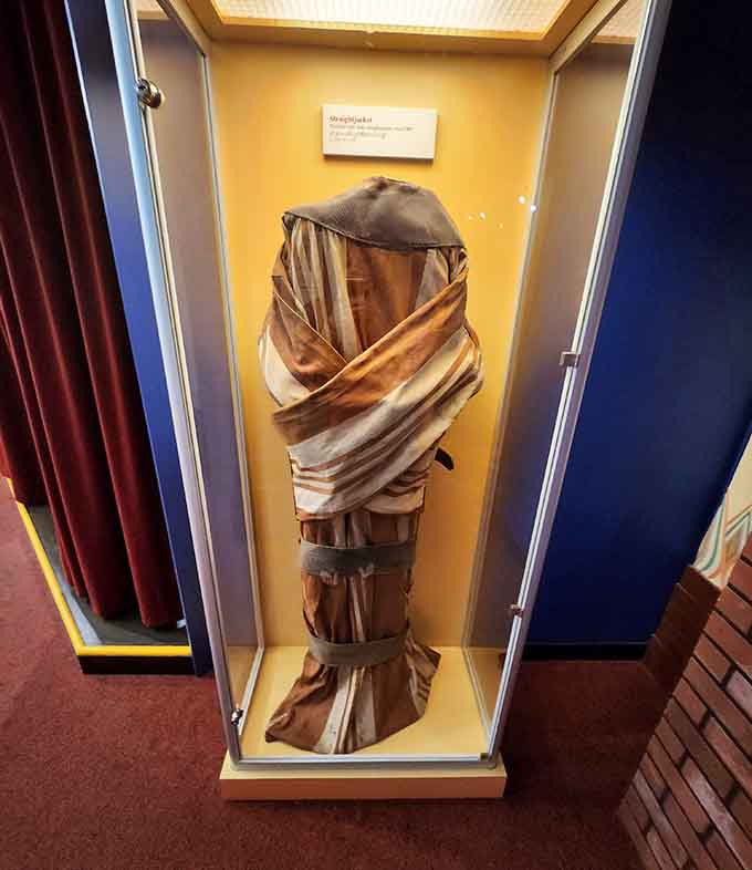 Houdini's actual straitjacket hangs here, the same fabric that once bound the world's greatest escape artist.