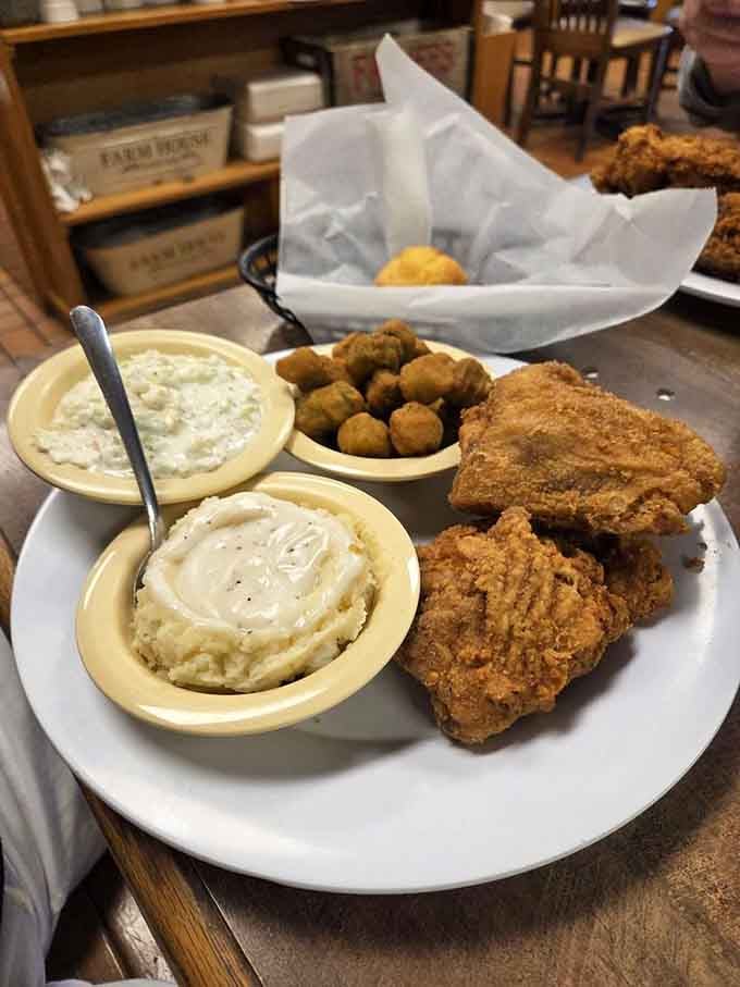 Golden fried chicken with creamy coleslaw and okra that would make your Southern grandmother nod in approval, maybe even smile.