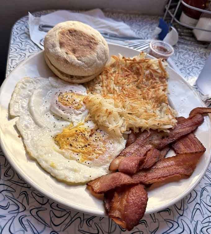 Golden hash browns, crispy bacon, and perfectly cooked eggs prove that simple done right beats fancy every time.