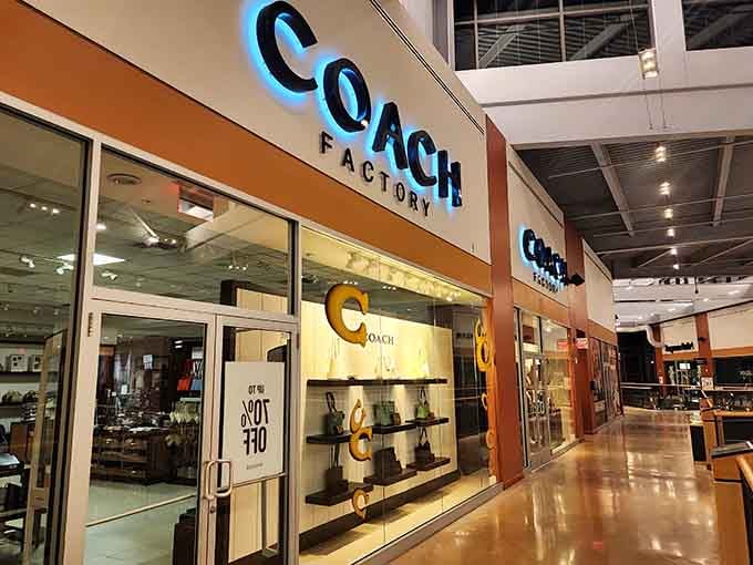The Coach outlet where luxury handbags become attainable dreams instead of impossible fantasies you admire from afar.