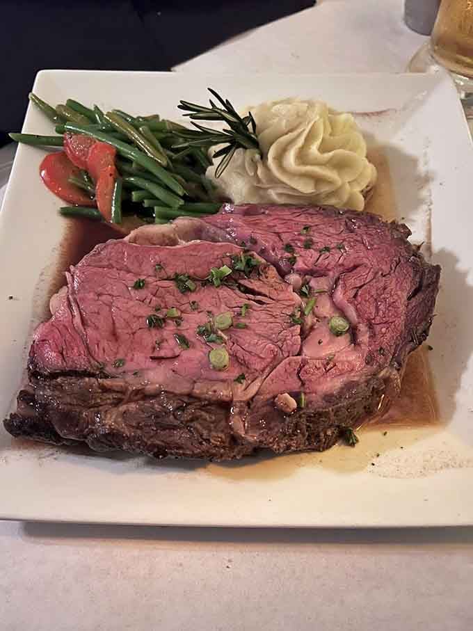 Behold the prime rib in all its glory, perfectly pink center and all, ready to convert even the staunchest vegetarians.