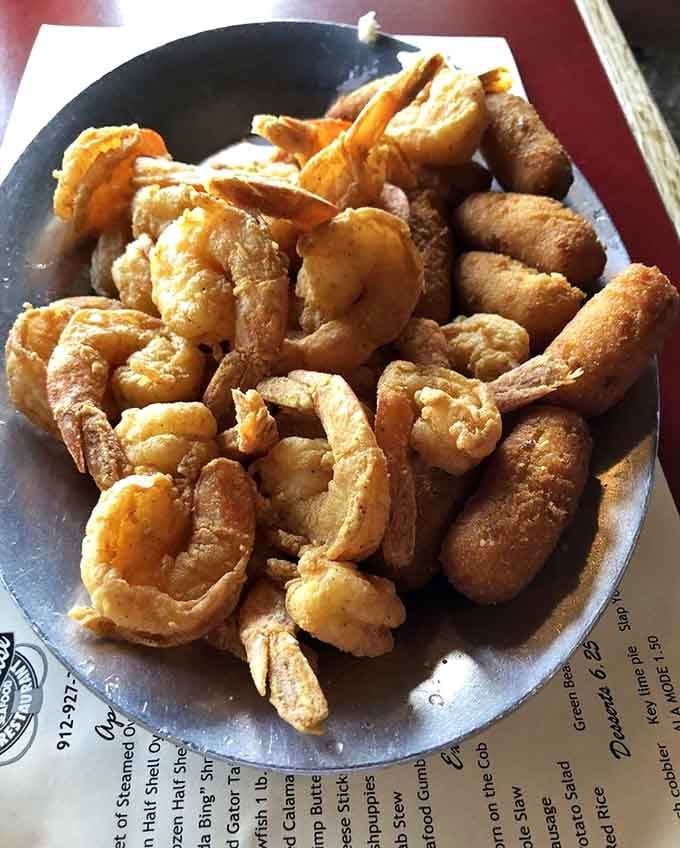 Golden fried shrimp and hushpuppies that'll make you forget every mediocre seafood platter you've ever endured.