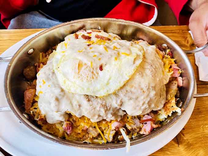 The Nasty Skillet lives up to its name in the best possible way, towering like Everest made of breakfast.