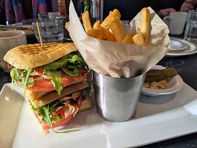 This turkey club stands tall like the Leaning Tower of Pisa, except it's actually worth the trip.