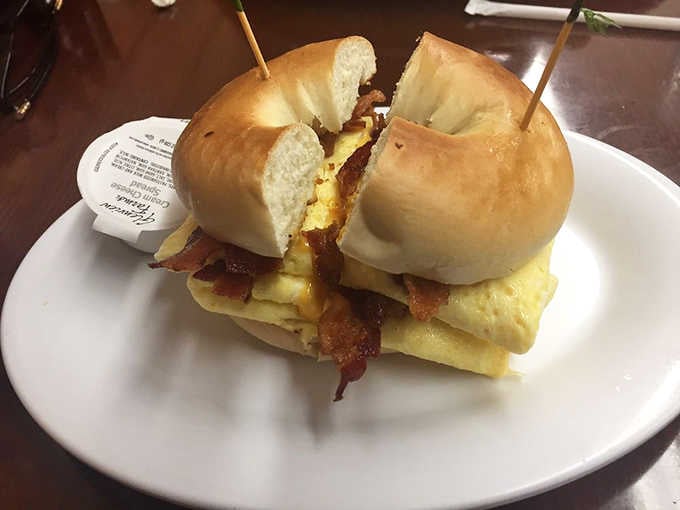 This bagel sandwich stacked with eggs, bacon, and cheese proves that simple ingredients become magic in the right hands.