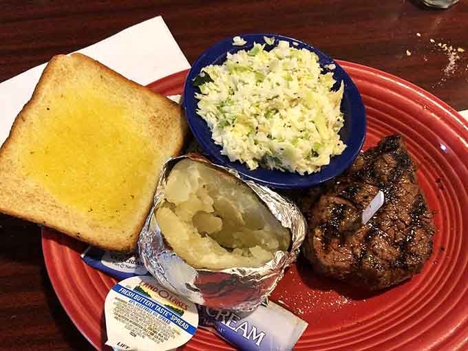 This filet mignon proves that perfection doesn't need fancy plating, just proper cooking and generous sides.