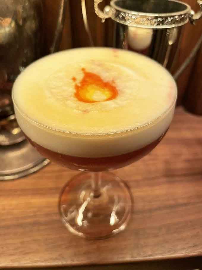 City on Fire lives up to its name with that flame garnish, proving presentation matters as much as taste.