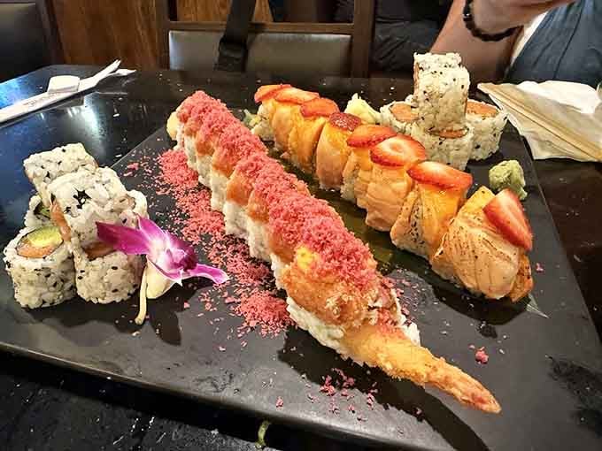 This artistic arrangement of specialty rolls looks like something Monet would paint if he worked with fish instead of lilies.