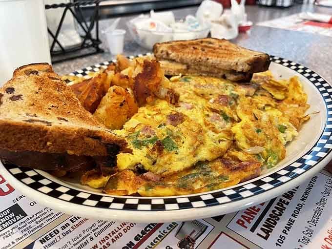 That fluffy Western omelet with perfectly golden toast and crispy home fries is what breakfast dreams are made of.