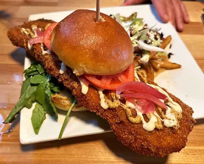 That golden-fried pork tenderloin sandwich is the kind of Midwestern masterpiece that dreams are made of.