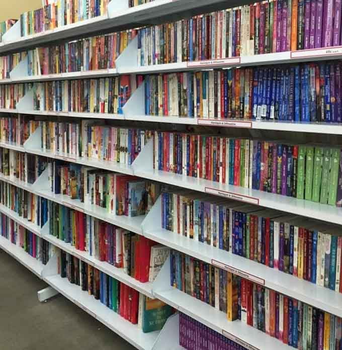 Rows of books promise countless adventures, mysteries, and knowledge for less than a latte.