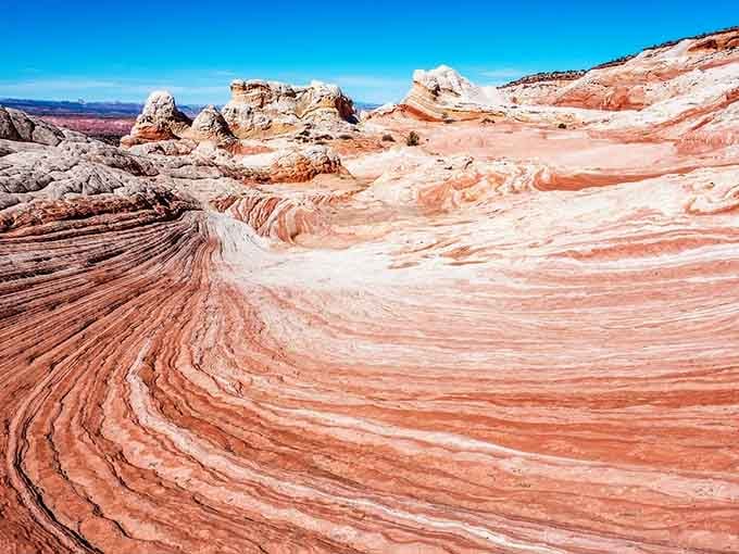 White Pocket looks like someone spilled a cosmic latte across the desert and forgot to clean it up.