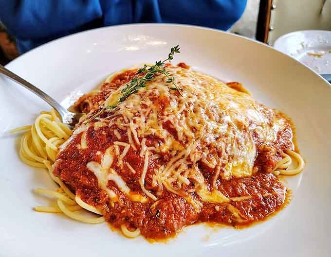 Chicken Parmigiana so generous it makes your grandmother's portions look stingy, and that's saying something truly remarkable.