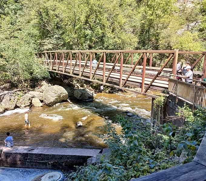 This charming footbridge offers front-row seats to nature's eternal performance without getting your shoes wet.