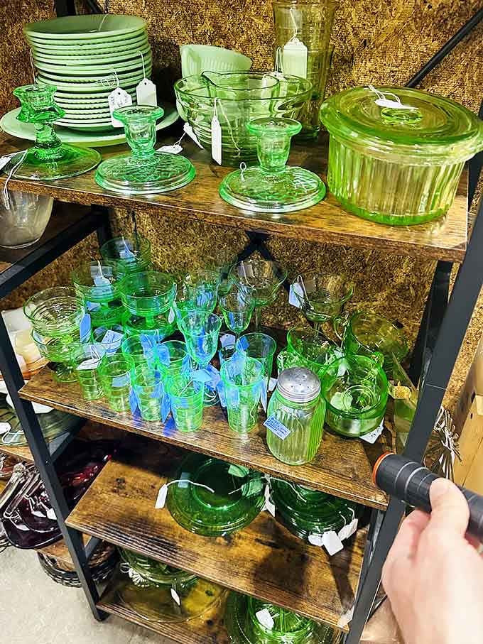 Green Depression glass stacked high enough to outfit every vintage kitchen fantasy you've been secretly harboring for years.