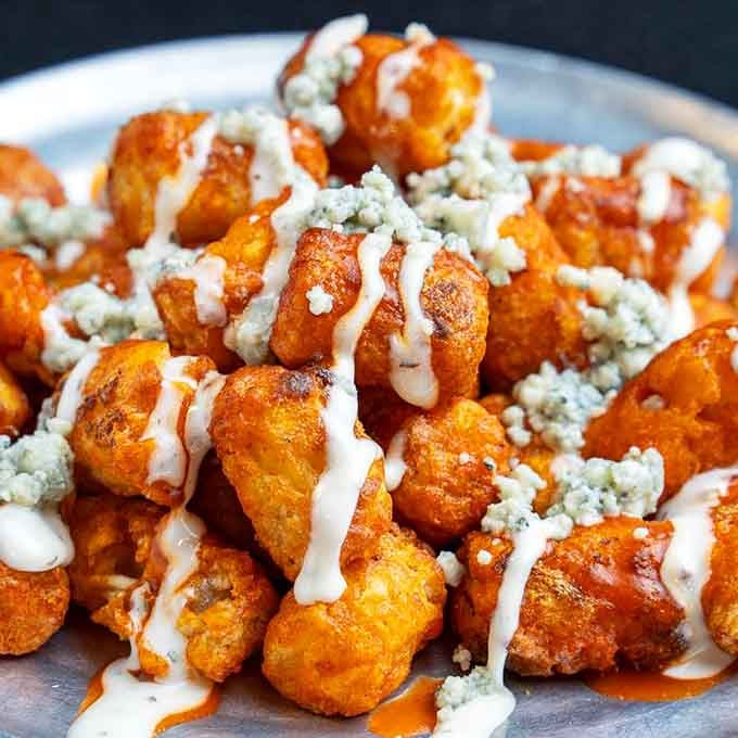 Golden, crispy, and topped with blue cheese, these aren't your average state fair cheese curds at all.