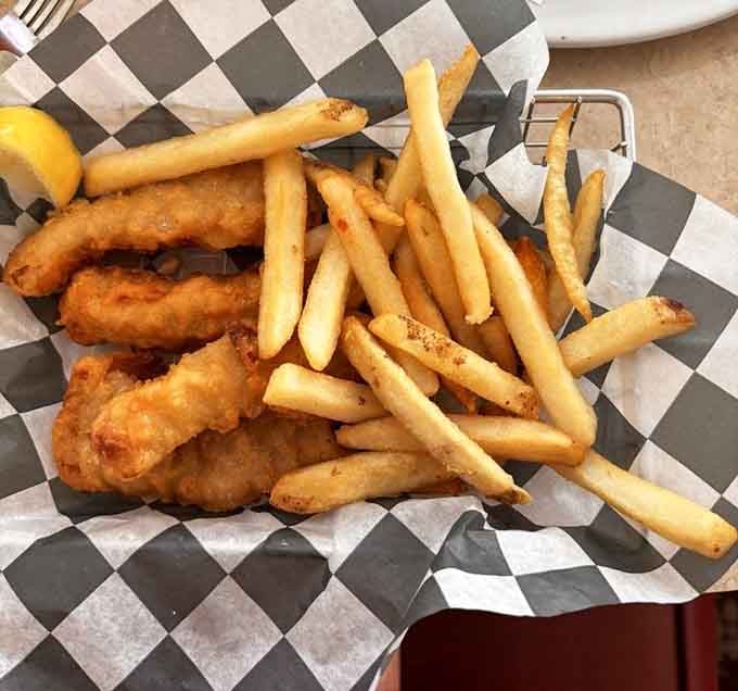 Golden, crispy fish with perfectly seasoned fries proves simple done right beats fancy every time.
