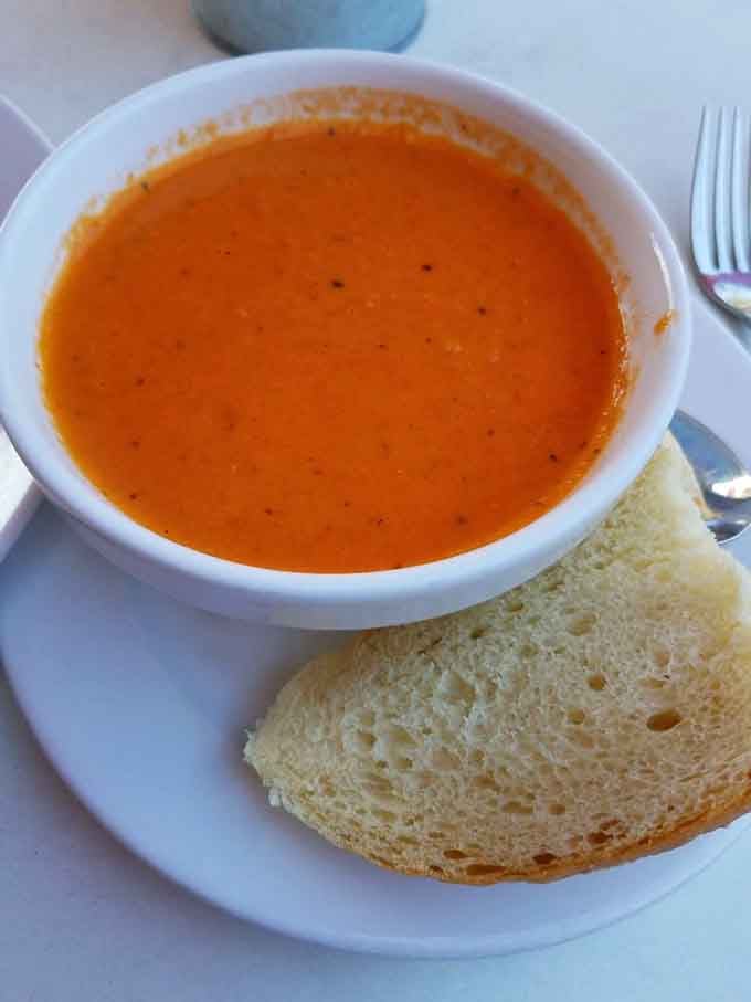 That vibrant orange glow isn't a sunset, it's tomato soup that'll make you reconsider everything you thought you knew about comfort food.