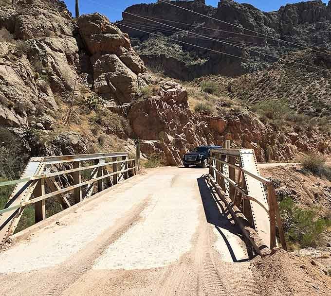 This vintage bridge spanning the rugged canyon proves that human engineering can complement nature's masterpiece rather than compete with it.