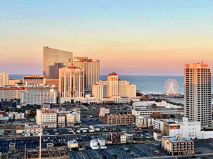 Sunset paints the skyline in cotton candy hues while that Ferris wheel promises simple joys by the sea.