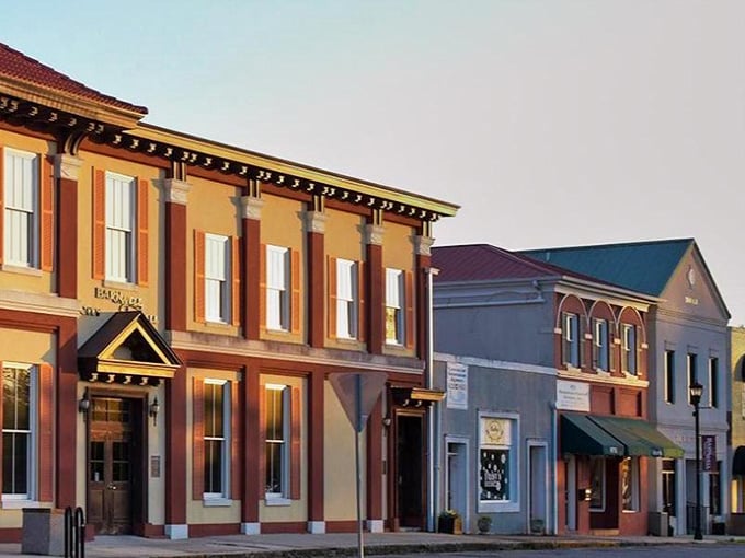 Golden hour light bathes Laurens in warmth, highlighting restored facades that prove history and affordability can coexist beautifully together.