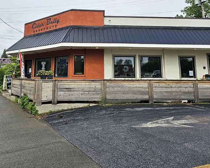 The burnt orange facade and modern outdoor seating prove that donut shops can rock a contemporary look with serious style.