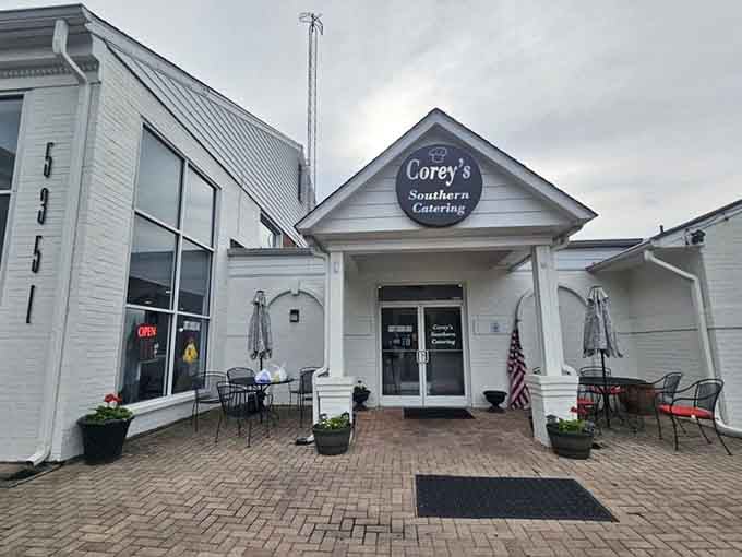 A brick patio and patriotic bunting suggest someone here takes their fried chicken very seriously indeed.