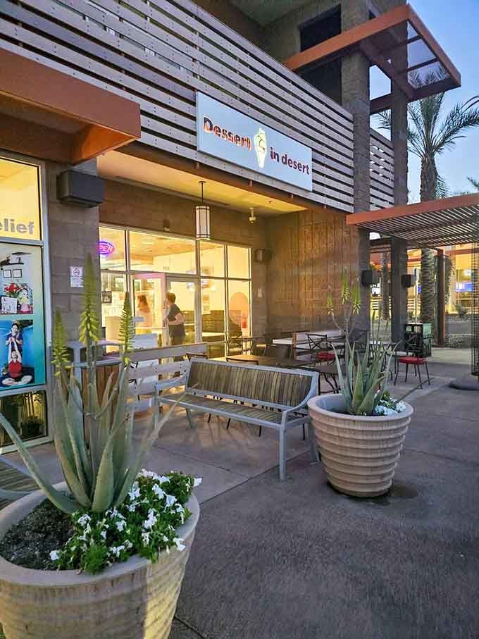 Modern desert architecture meets frozen treats as golden hour light bathes this contemporary dessert destination in warm glow.