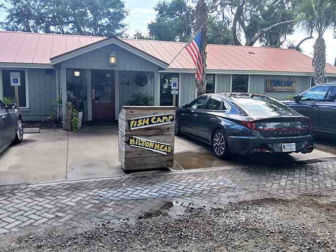 That rustic sign and American flag signal you've arrived at a place where casual coastal dining meets serious seafood expertise.