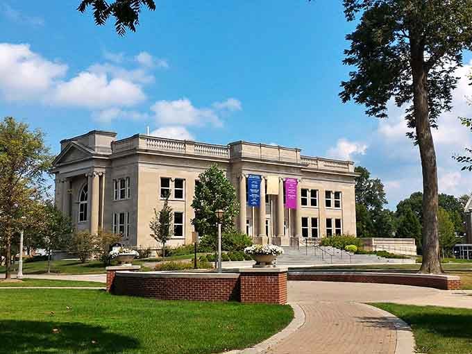 This neoclassical beauty with its grand columns proves that small towns can have big architectural ambitions and style.