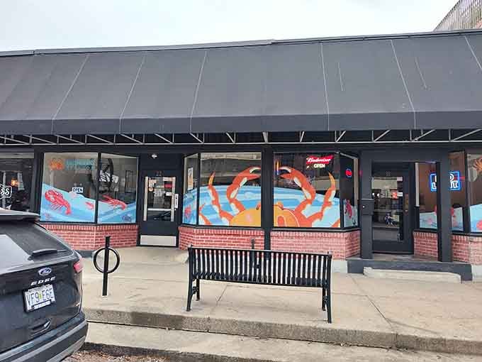 Bright crab artwork on the windows signals fresh catches inside&mdash;this storefront doesn't hide its coastal ambitions one bit.