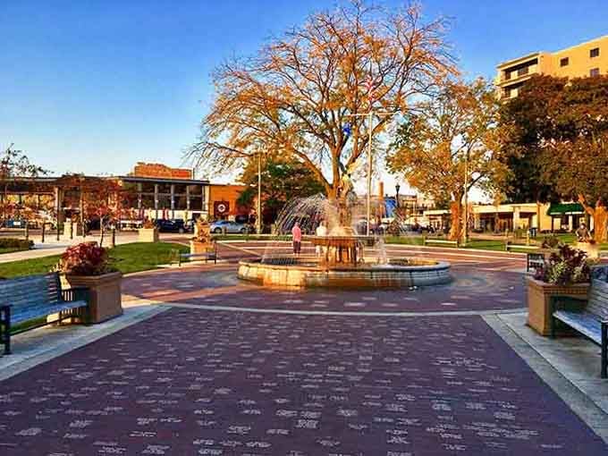 Golden hour transforms this fountain plaza into something magical, like a movie set waiting for its close-up.