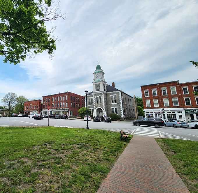 That elegant clock tower stands watch over the green like it has for generations of Sunday strollers and town meetings.