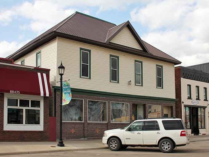 Classic small-town storefronts line Lonsdale's main street, where neighbors still stop to chat on the sidewalk.