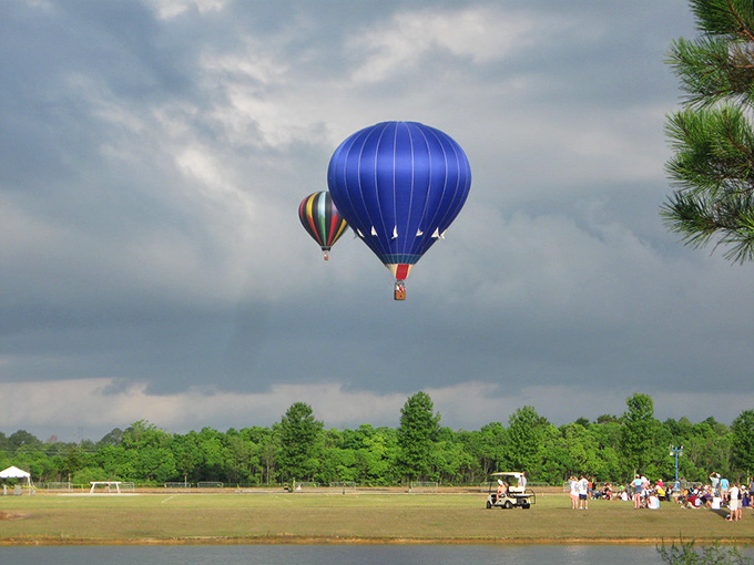 Hot air balloons drift lazily across the sky, proving that slow and steady wins the relaxation race.
