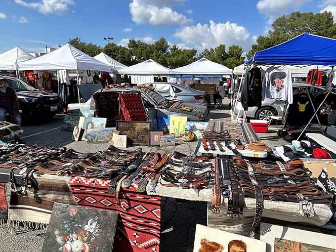 Vintage textiles and handcrafted treasures spread across tables like a museum exhibit you're actually allowed to touch and buy.