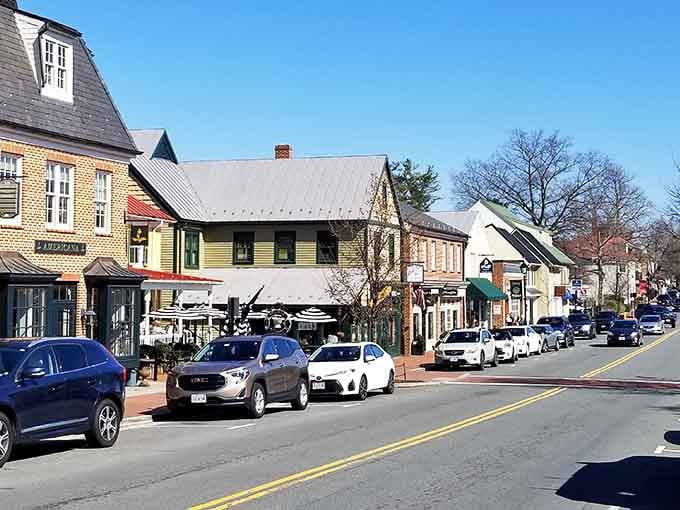 Blue skies frame a perfect day for strolling past shops where every doorway promises another tasty discovery inside.