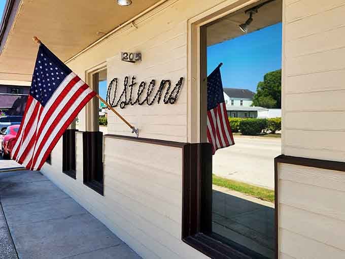American flags flanking the entrance like sentries guarding a national treasure, which honestly isn't far from the truth.