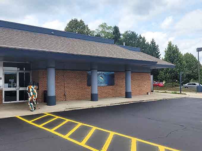 Ocean Seafood's unassuming brick exterior hides fresh catches and friendly service, proving great food needs no flashy facade.