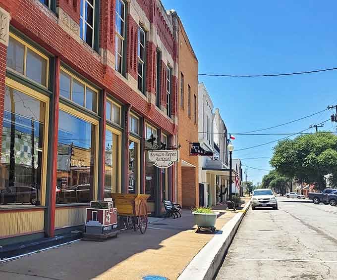 Colorful brick buildings pop against blue skies, proving small-town charm never goes out of style.