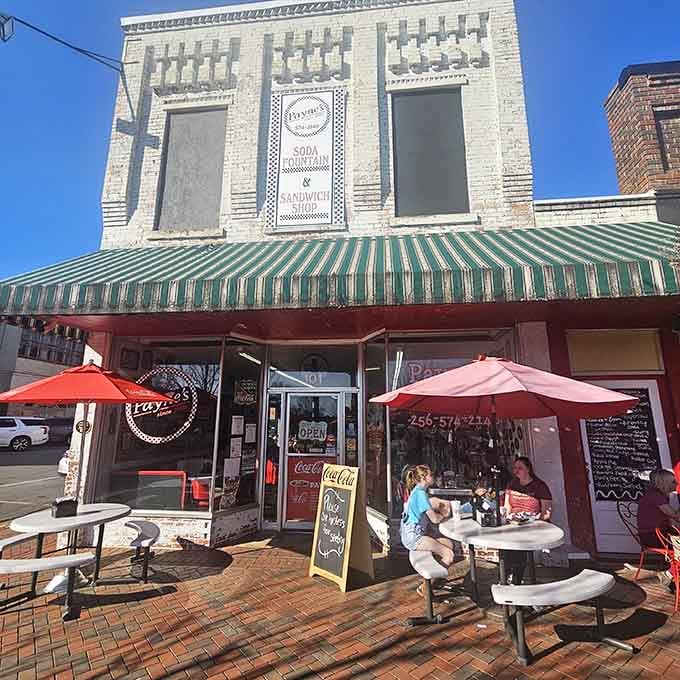 That classic striped awning and vintage Coca-Cola sign transport you straight back to simpler, sweeter times.