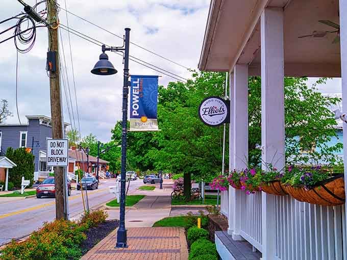 Hanging flower baskets and welcoming porches make every sidewalk stroll feel like visiting an old friend who always has cookies ready.