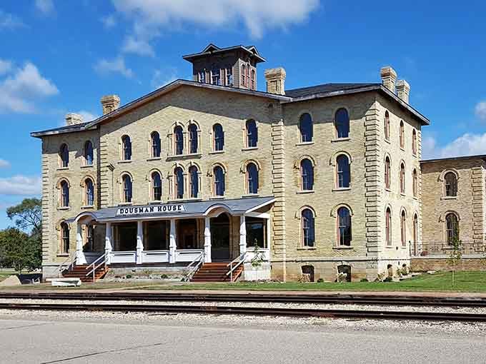 This limestone beauty sits trackside like a grand dame waiting for her train, porches wrapped around her like a welcoming embrace.