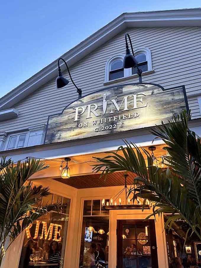 Golden hour lighting on that weathered sign creates the kind of ambiance that makes every meal feel like a celebration.