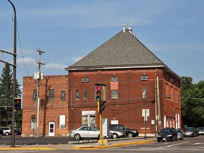 Red brick charm meets practical living in this distinctive building where history and affordability shake hands daily.