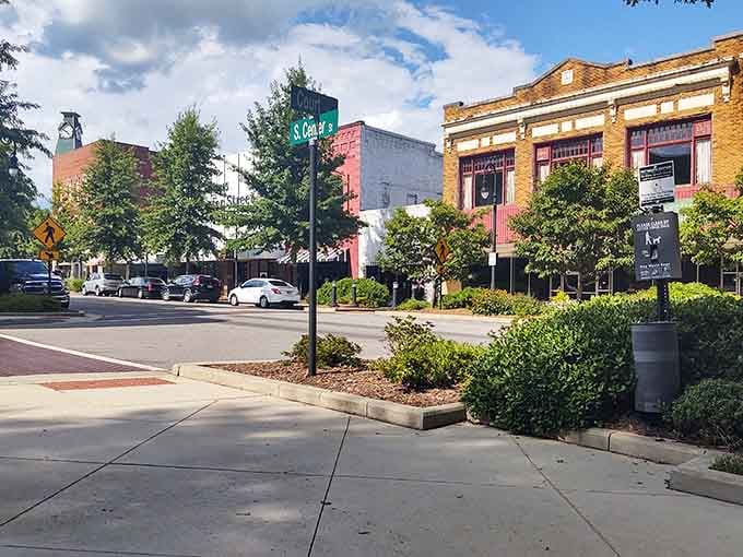 Tree-lined streets and classic storefronts create that Norman Rockwell vibe we all secretly crave on busy days.