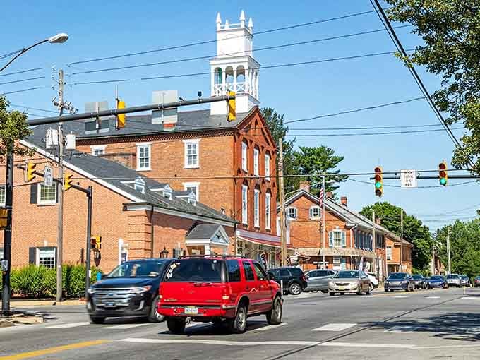 That white church steeple rising above brick buildings reminds you some towns still know how to do Main Street right.