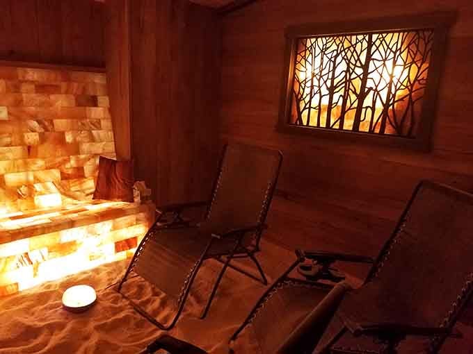 The artistic tree-branch window design adds a touch of nature to this glowing sanctuary of salt and serenity.