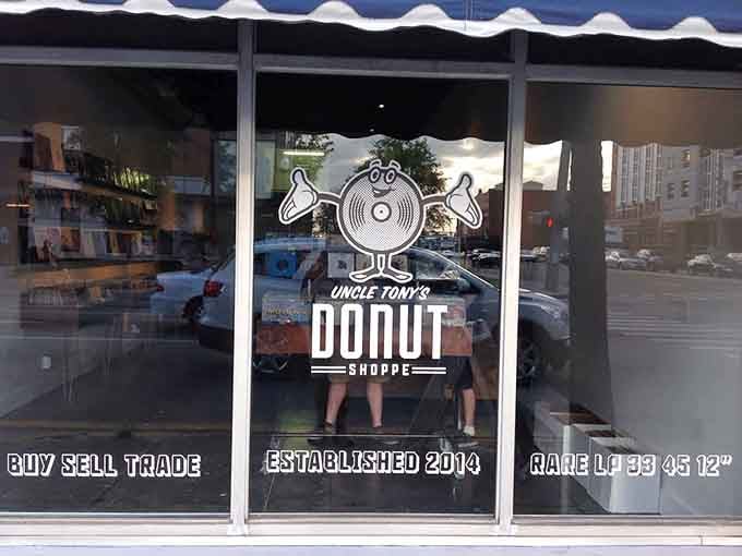 A donut-shaped record mascot greets you at the window – because why choose between breakfast and Beatles when you can have both?