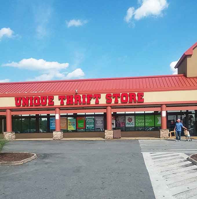 That cheerful red roof and blue sky combo creates picture-perfect conditions for discovering your next favorite outfit.